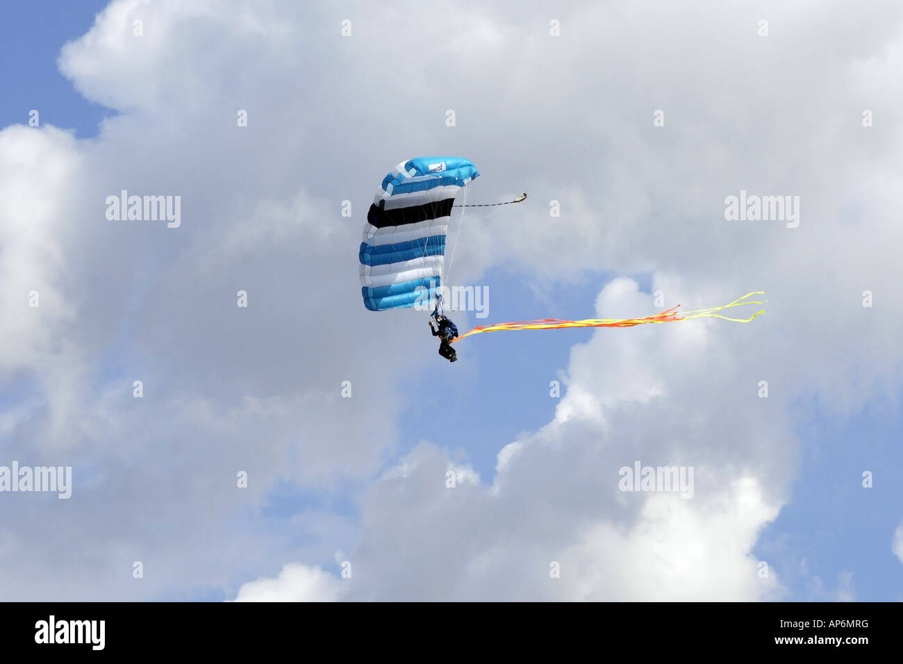 A Skydiver floats to earth using a new style rectangular parachute ...