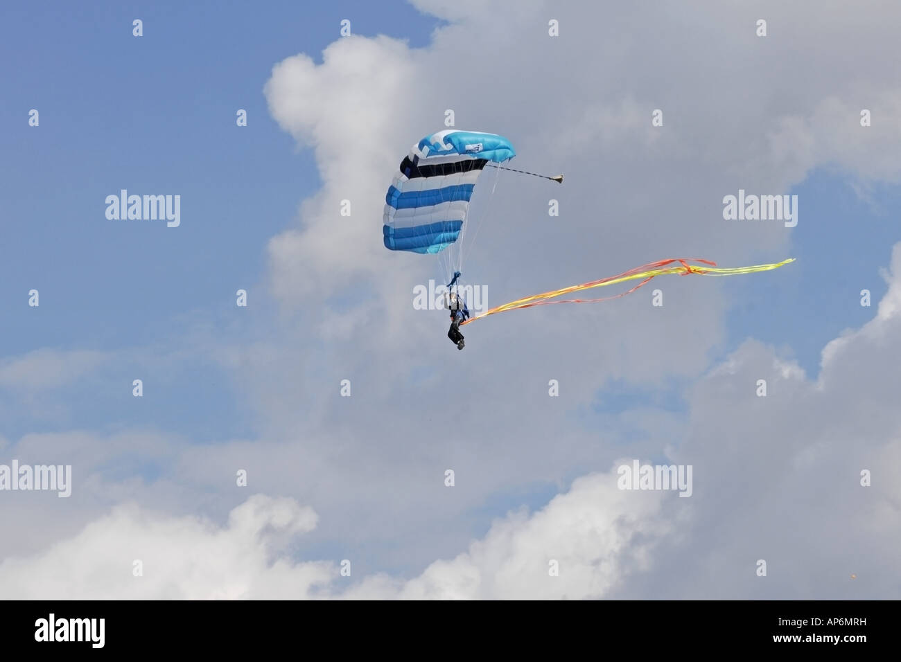 A Skydiver floats to earth using a new style rectangular parachute ...