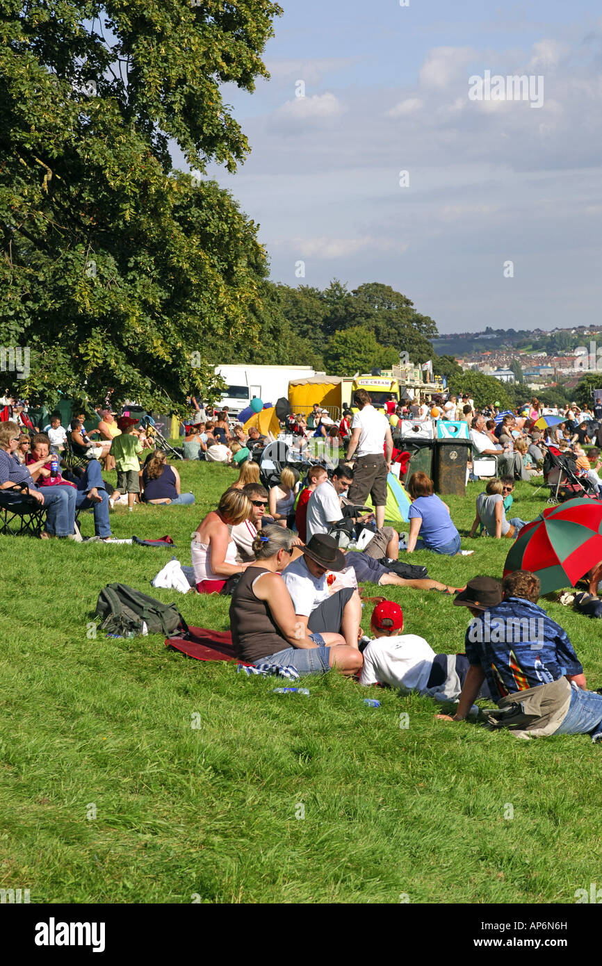 Group of people at a park enjoying a summers evening picnic Stock Photo ...