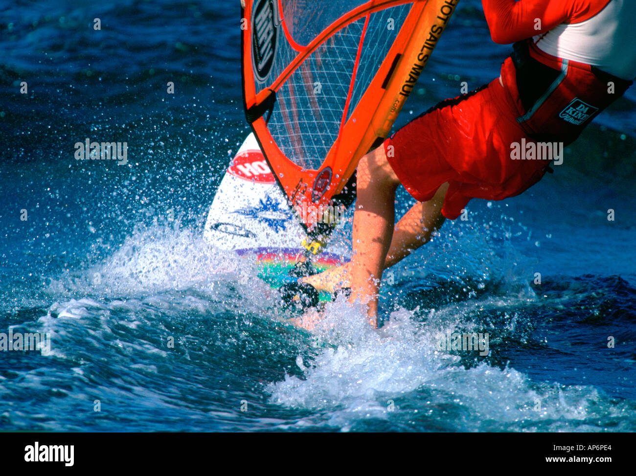 Windsurfer jumping waves, Hawaii Stock Photo - Alamy