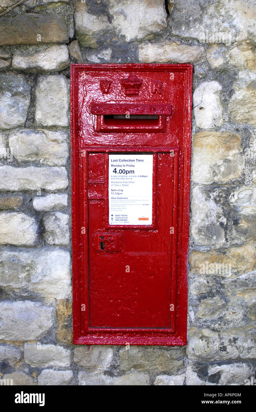 English Red Royal Mail Post box with the royal crown casting of Queen ...