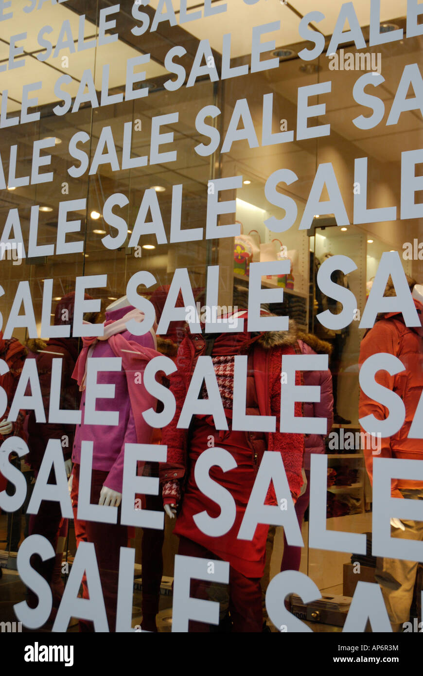 Sale signs in store window Stock Photo - Alamy