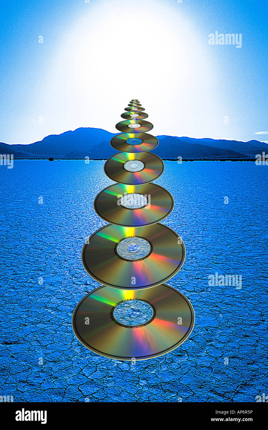 Compact discs flying in the desert, digital composite Stock Photo - Alamy