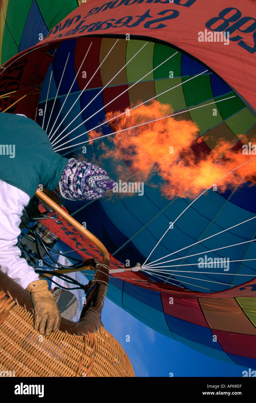 Man inflating a hot air balloon, Colorado Stock Photo - Alamy