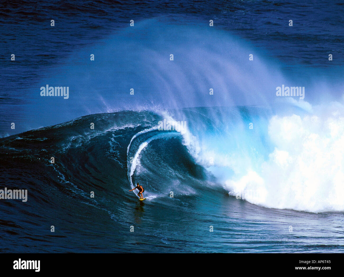 Big wave surfing action, Maui, Hawaii Stock Photo - Alamy