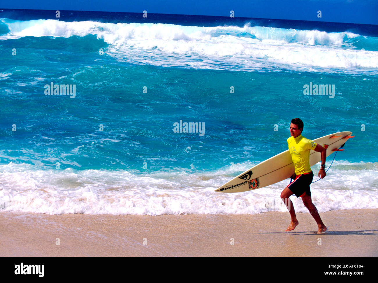 Surfing scene Gab Davis on North Shore Hawaii Stock Photo - Alamy