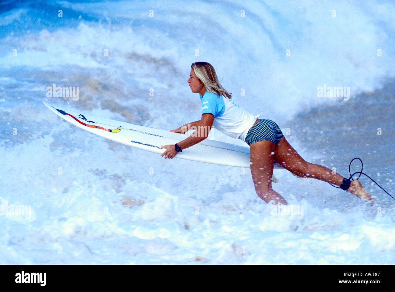 SURFING ACTION WOMAN Stock Photo - Alamy