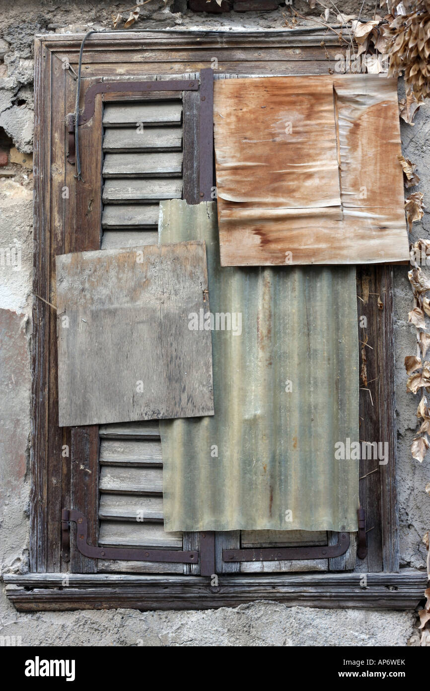 Old and patched window Stock Photo - Alamy