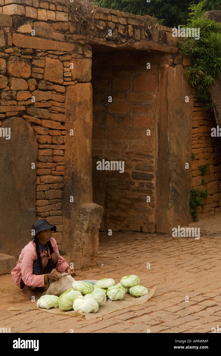woman selling cabbage at one of the 7 gates, Queen's compound ...