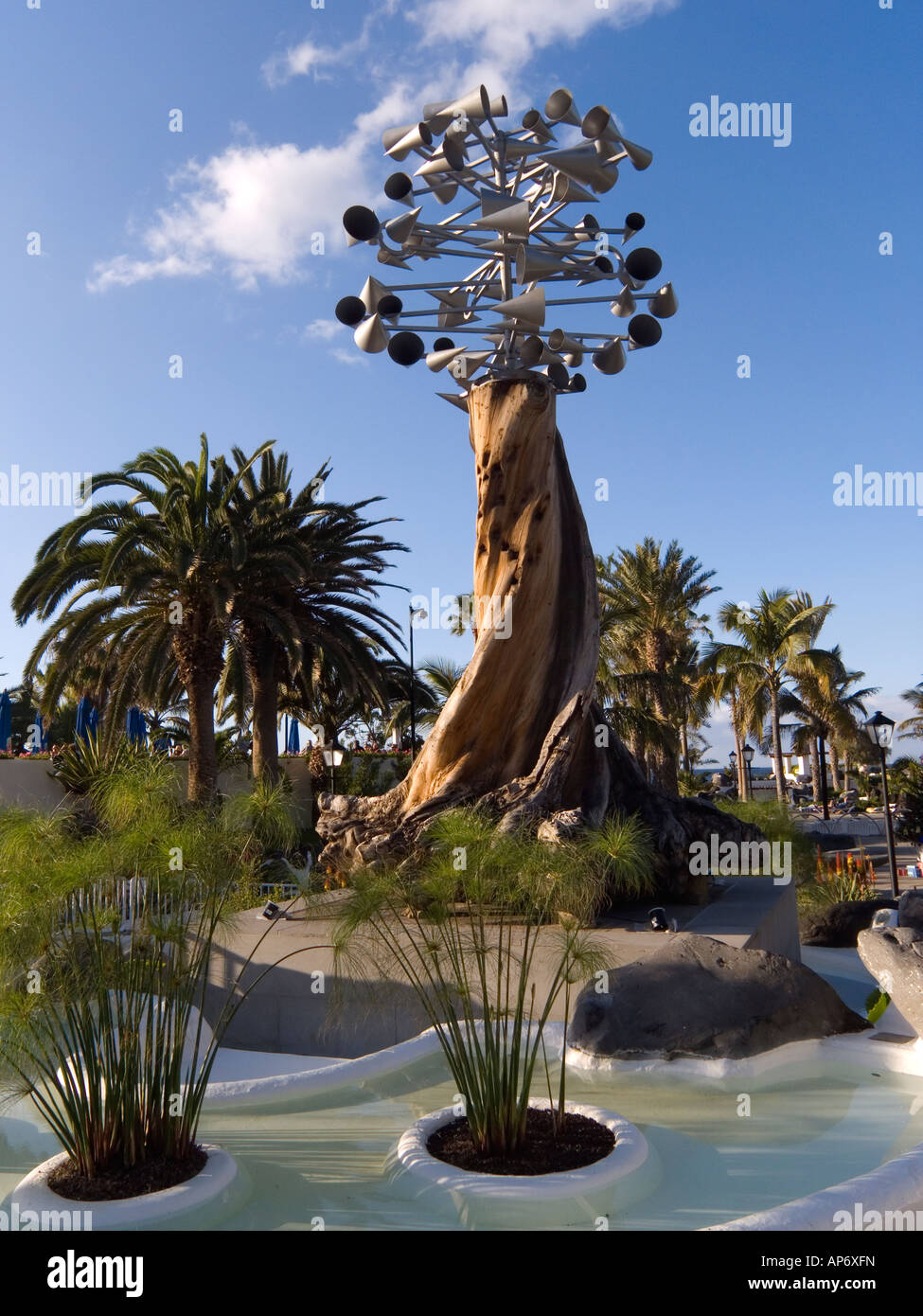 Sculpture by artist Cesar Manrique a tree trunk with wind vanes at the ...
