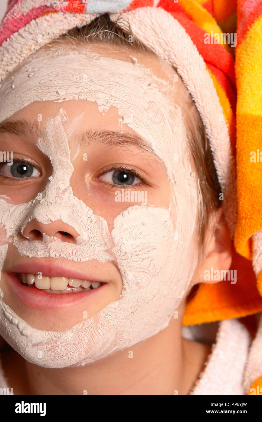 Young teenage girl wearing a beauty face mask Stock Photo - Alamy