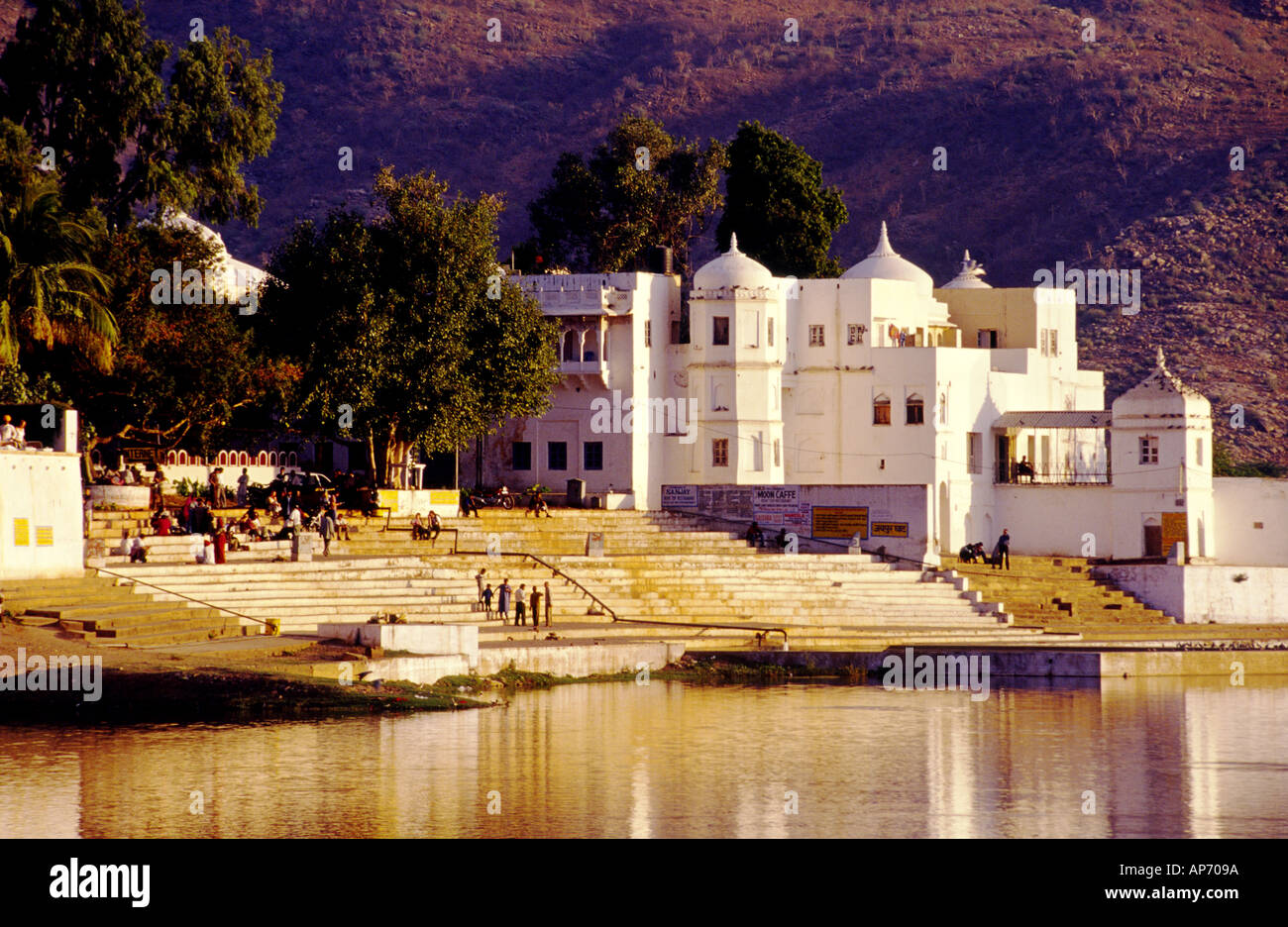 Pushkar Lake looking towards Main Bazaar with a beautiful palace in the ...