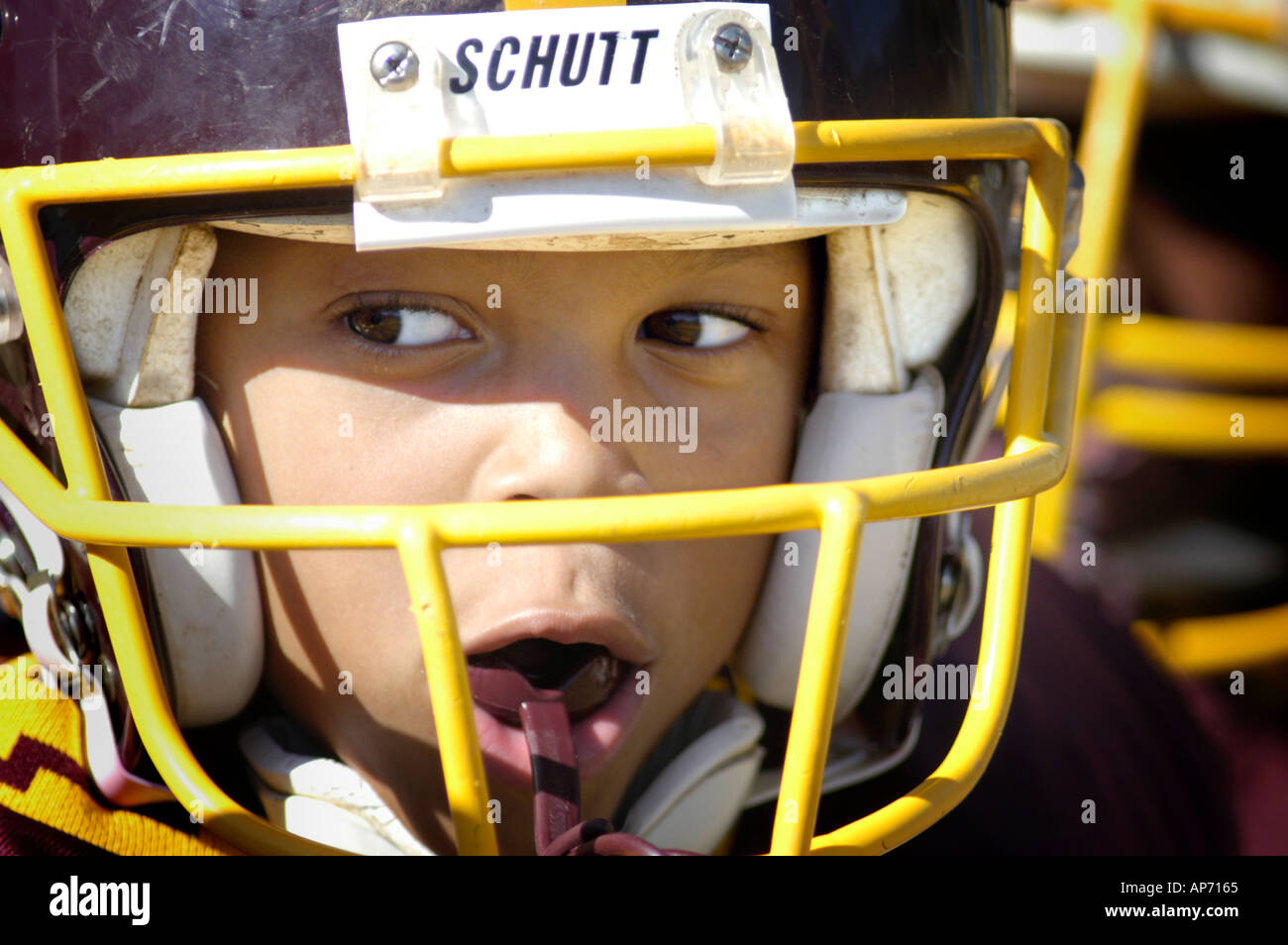 USA full contact football kids game 7 and 8 years old boy is worried ...