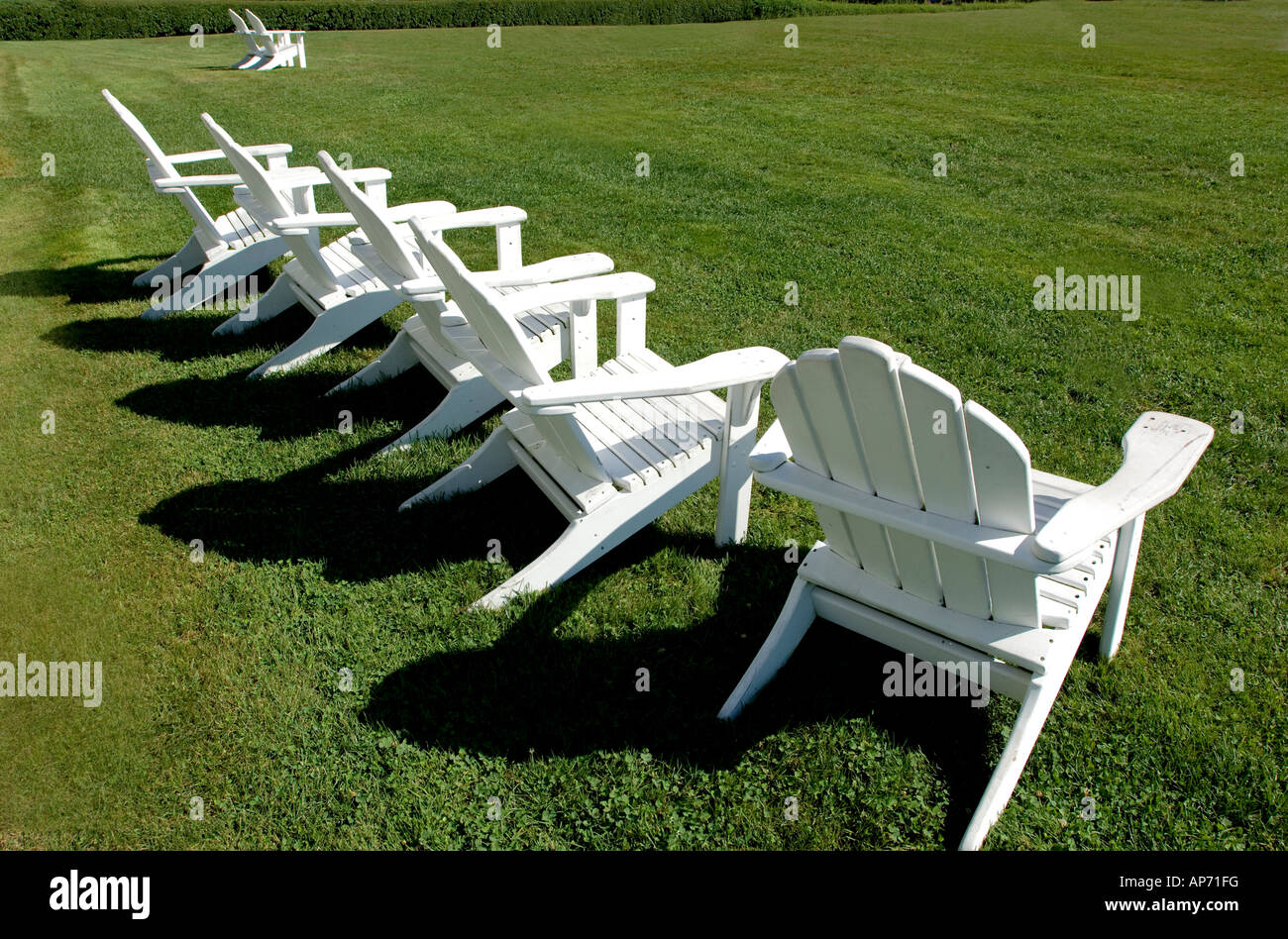 White lawn chairs on summer green lawn, Block Island, Rhode Island, USA ...