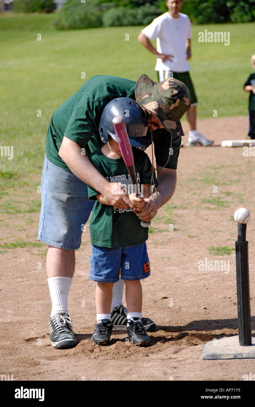 5 to 7 year old Children get their first experience playing baseball ...