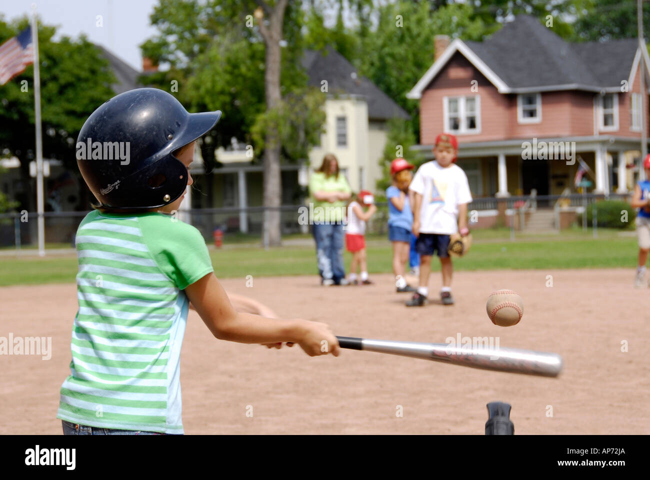 5 to 7 year old Children get their first experience playing baseball ...