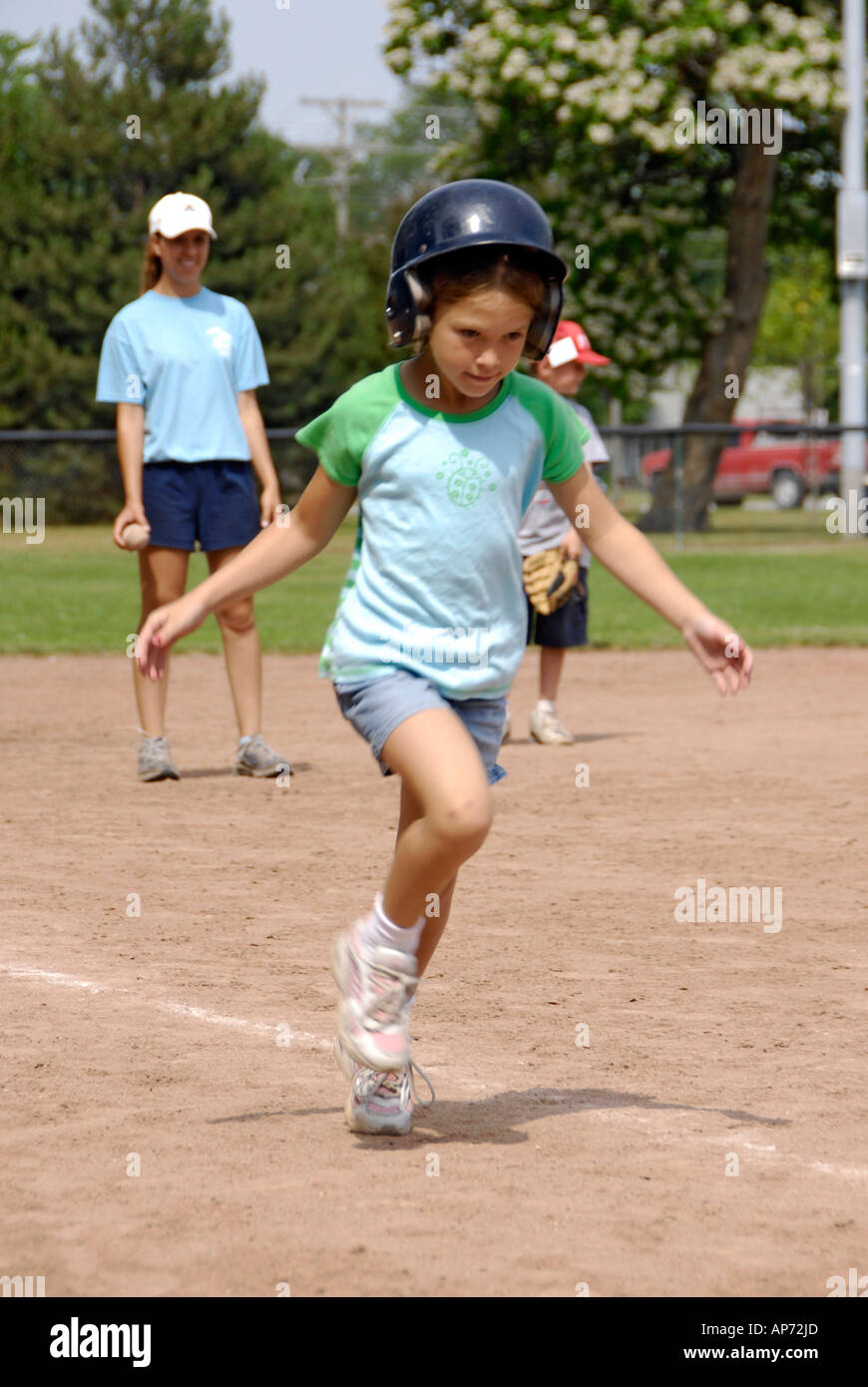 5 to 7 year old Children get their first experience playing baseball ...