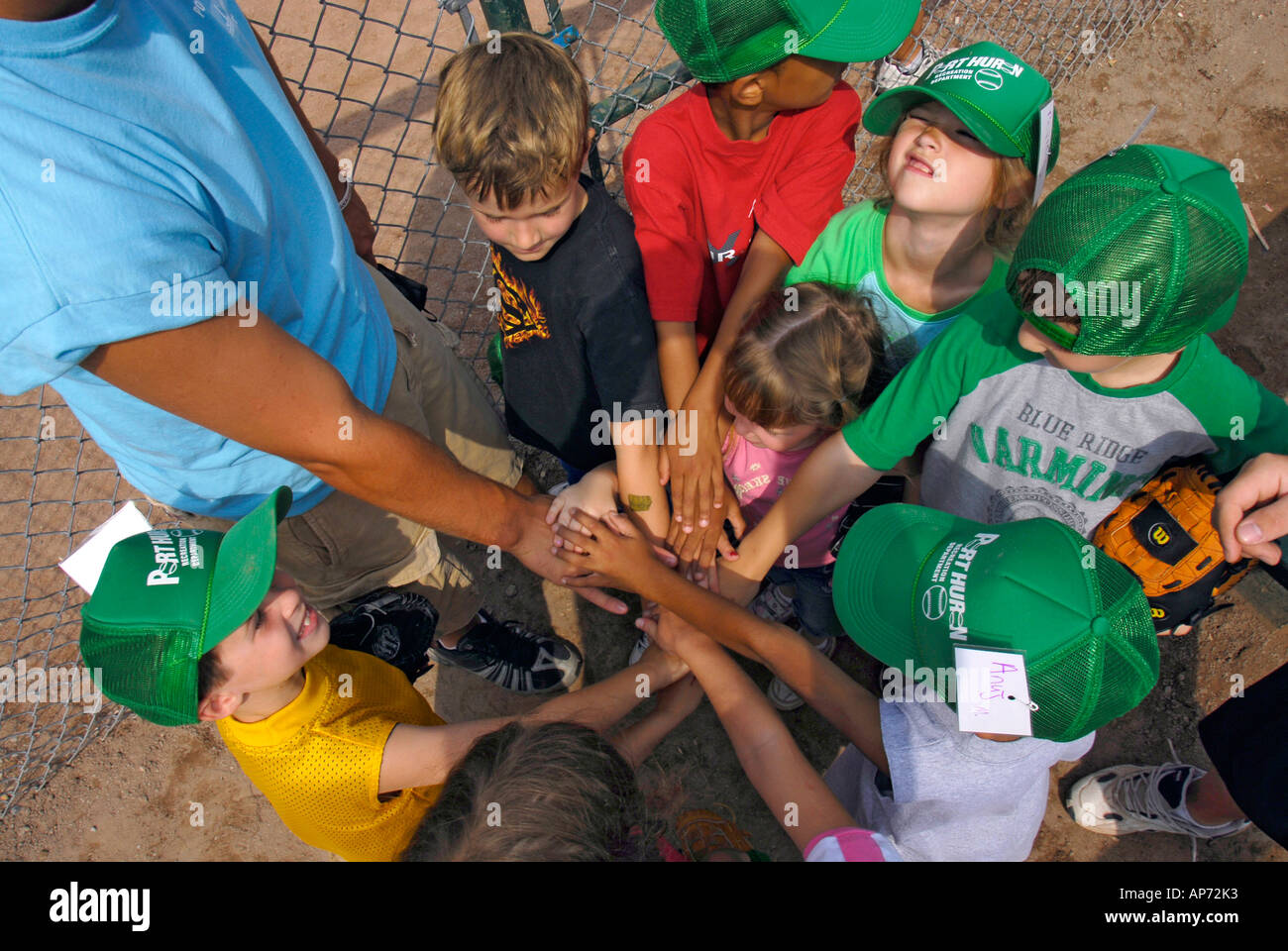 5 to 7 year old Children get their first experience playing baseball ...
