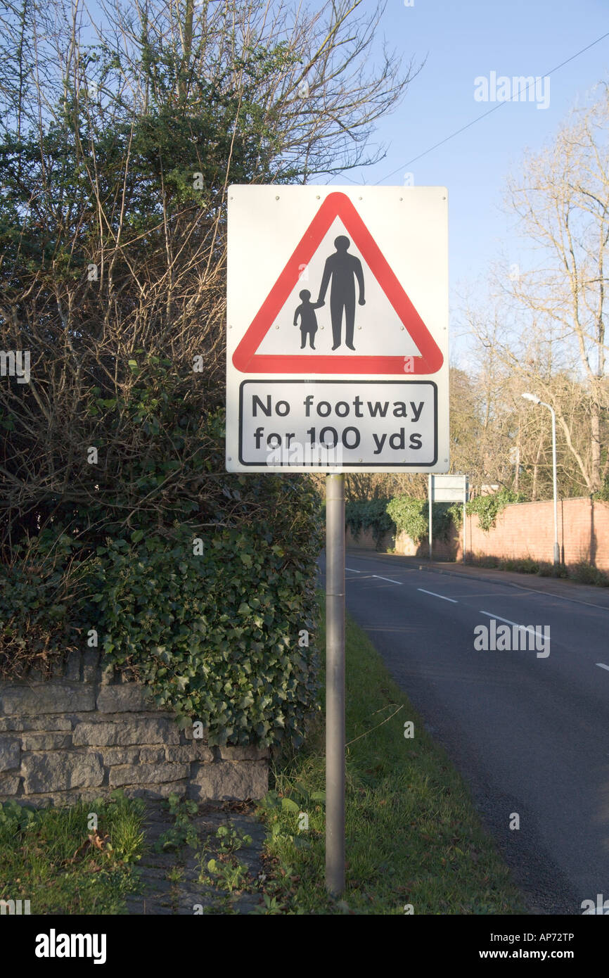 A road sign indicating no footway for 100 yards Stock Photo - Alamy