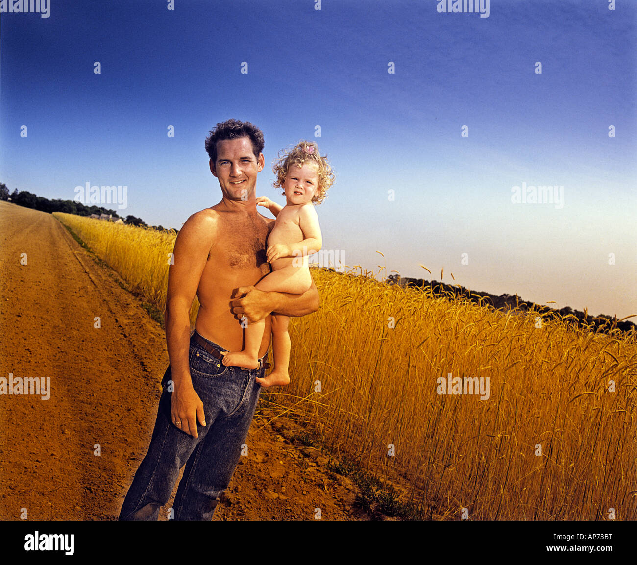 Father with son in rural setting Stock Photo - Alamy