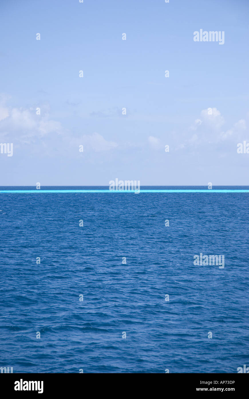 Sandy reef surface surrounded by deeper water Stock Photo - Alamy