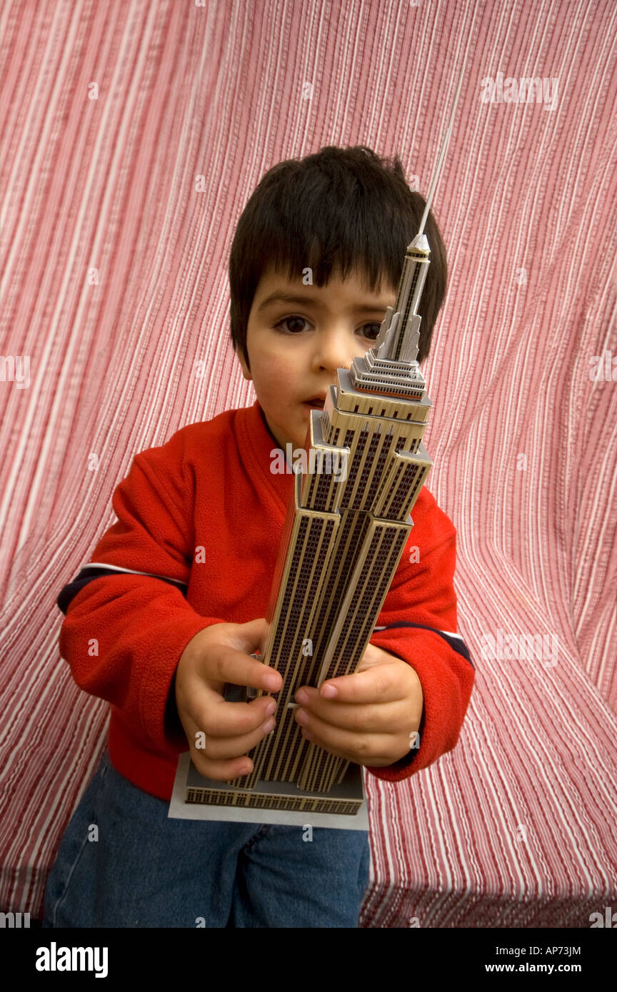 Kid Playing With Cardboard Model Empire State Building Stock Photo - Alamy