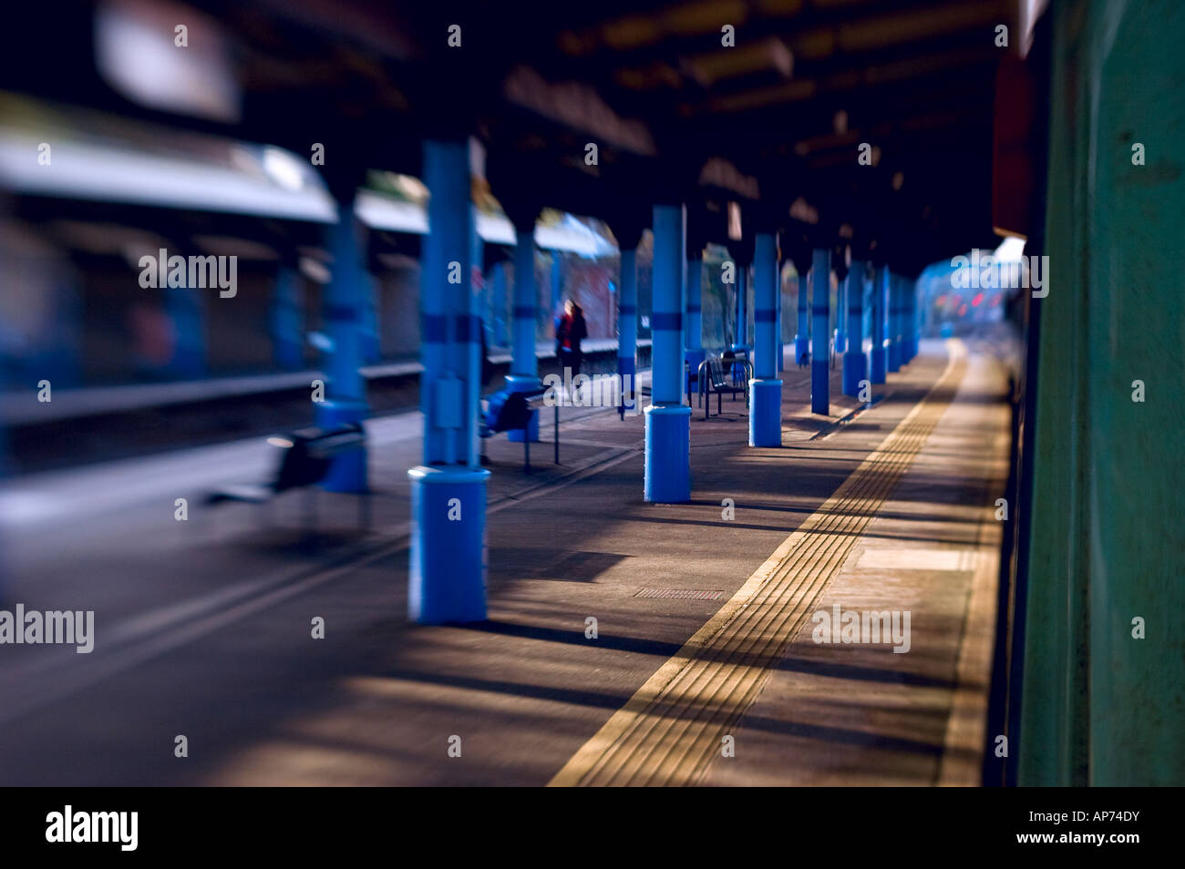 Train Passing Through Station on Route to London Stock Photo - Alamy