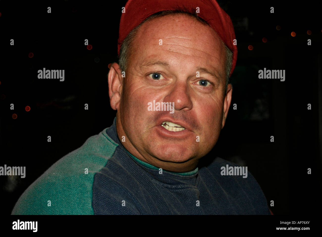 Middle Aged Man Snarling Stock Photo - Alamy