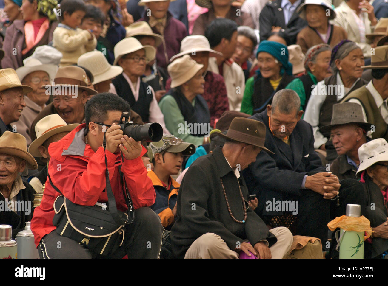 Crowd of Tibetans at a festival during Shoton celebrations Lhasa Tibet ...