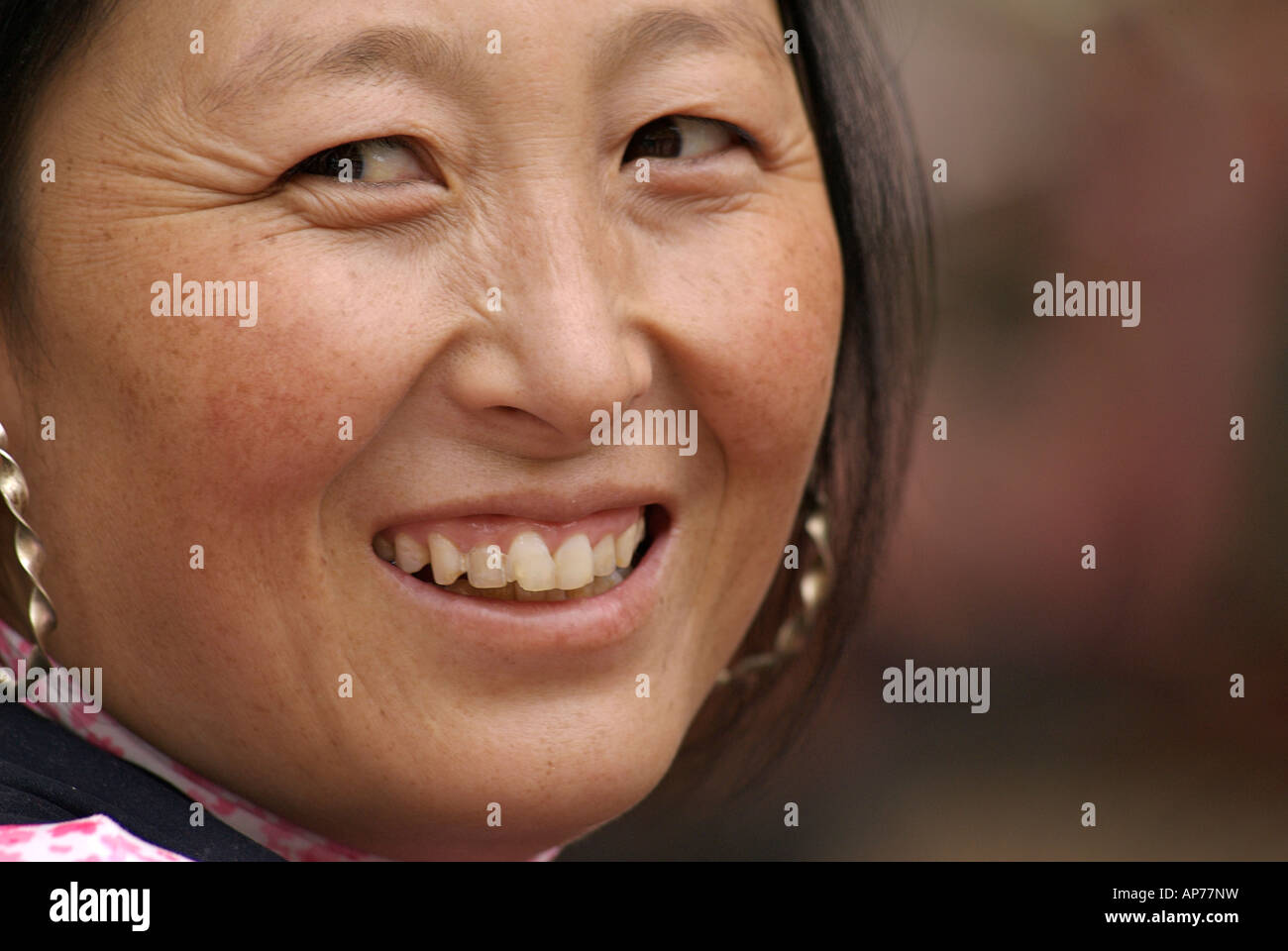 Smiling portrait of a Tibetan woman Lhasa Tibet Stock Photo - Alamy