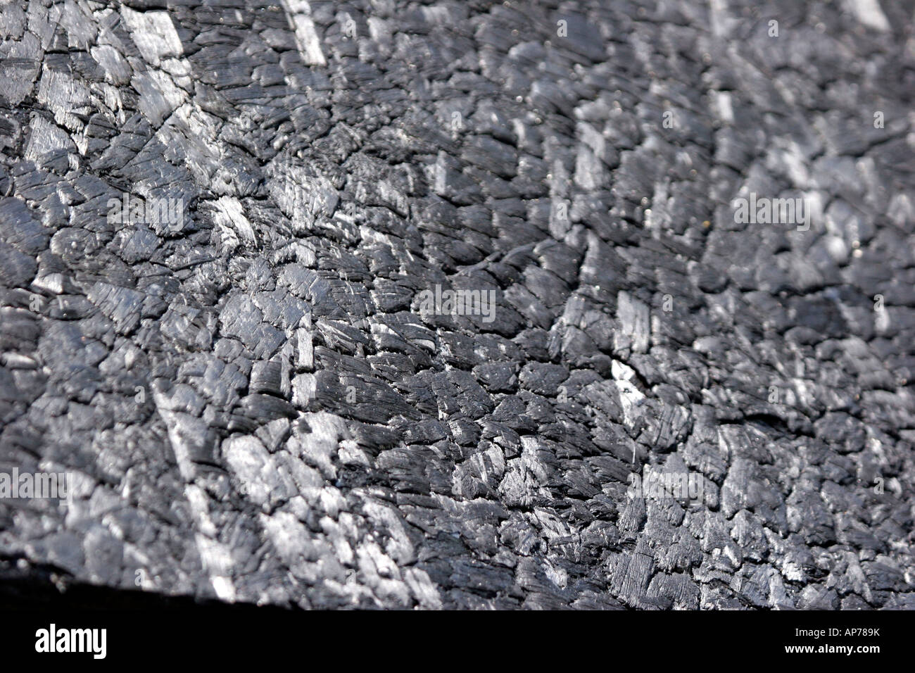 Burnt wood fibers clear focus in the center showing fire damage Stock ...