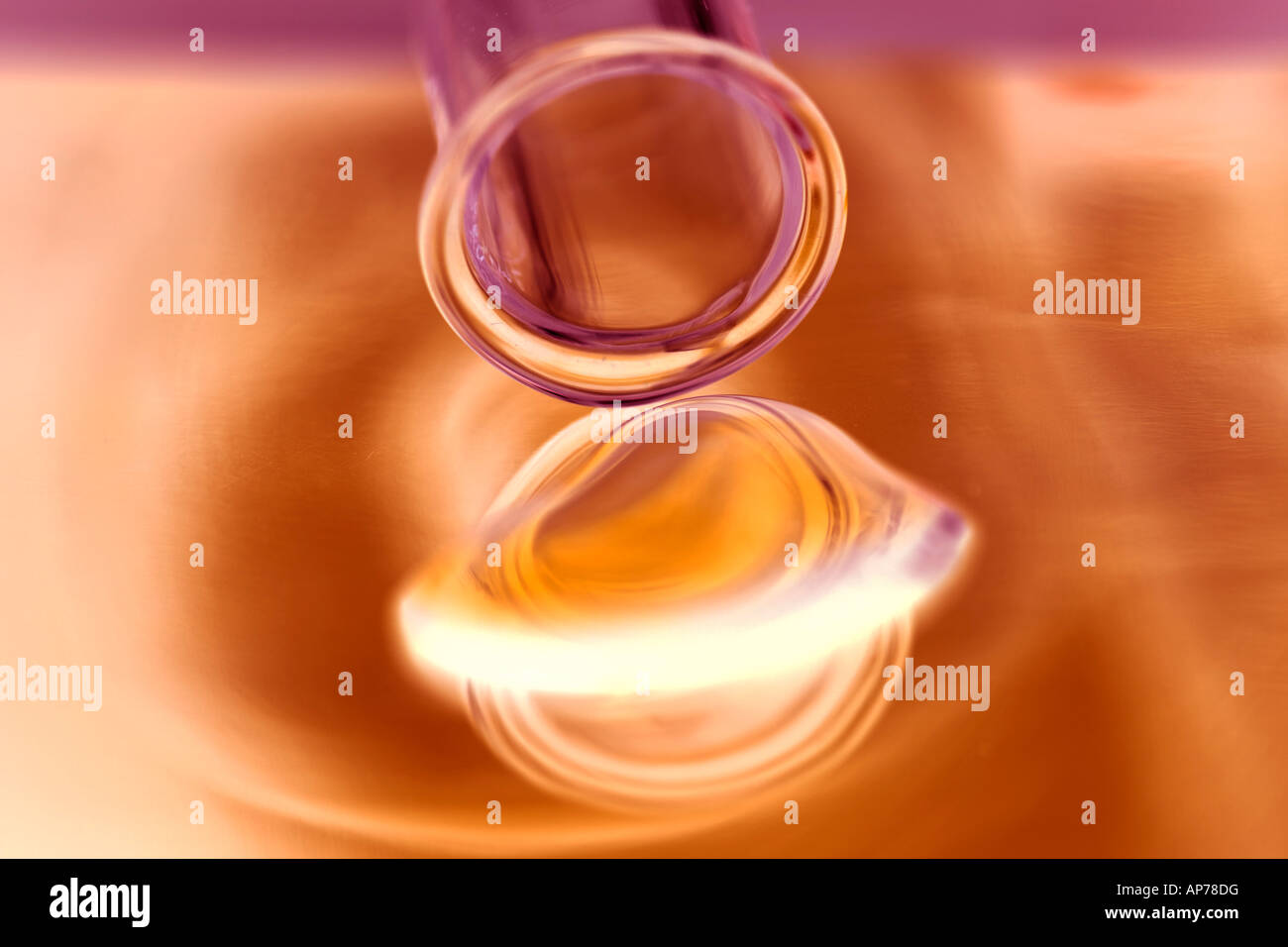 glowing spill from test tube blue droplets water chemical or corrosive ...