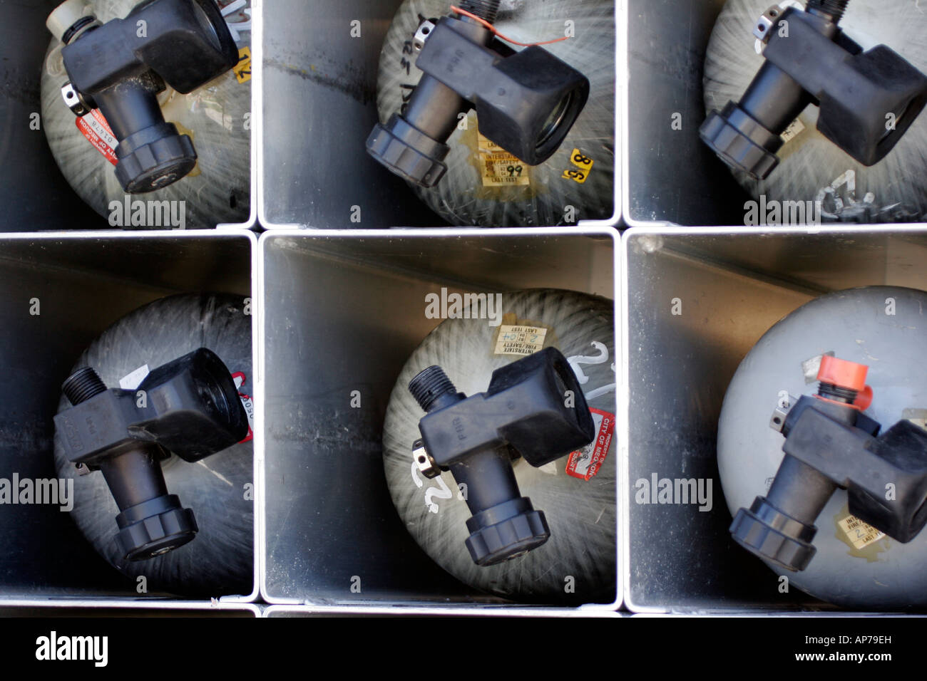 SCBA air tanks being stored inside a cabnet on a fire truck Stock Photo ...