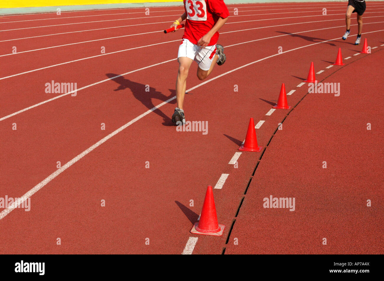 Running athlete at the stadium Stock Photo - Alamy