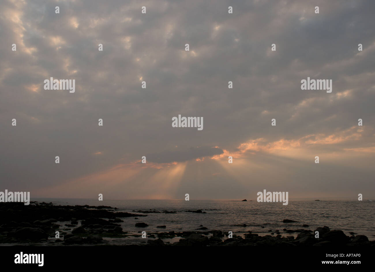 Sun breaking through dark clouds hi-res stock photography and images ...