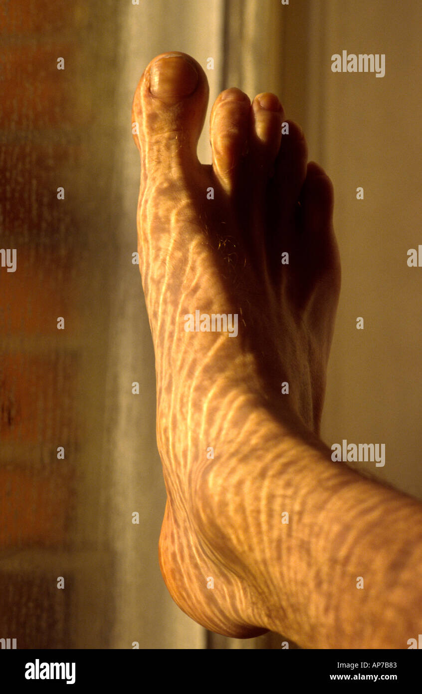 Single Foot in evening sunshine with rain shadows Stock Photo - Alamy