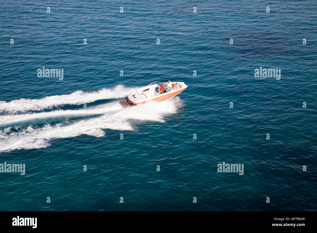 Speedboat travelling at speed across the sea Stock Photo - Alamy