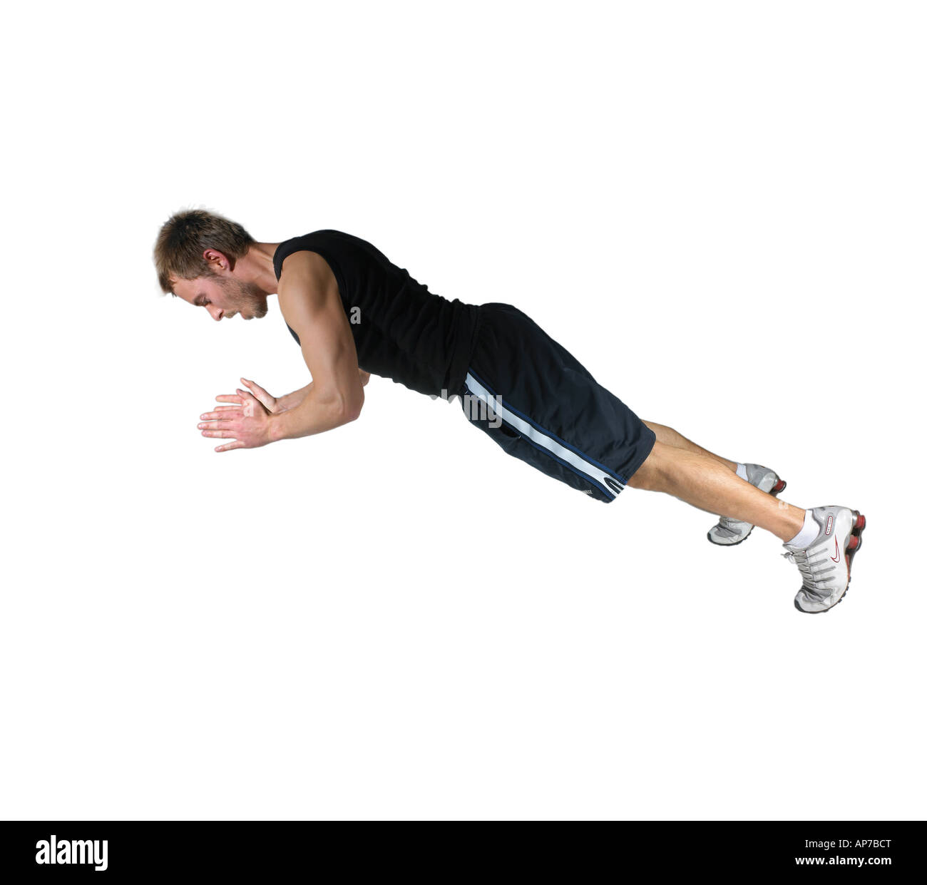 man doing clap press up exercise Stock Photo - Alamy