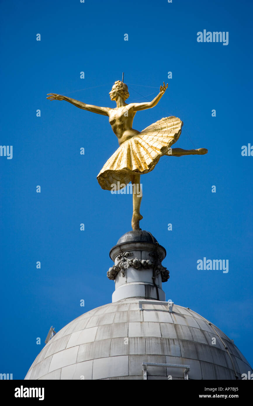 The gilded statue of ballerina Anna Pavlova on the cupola of Victoria Palace Theatre London ...