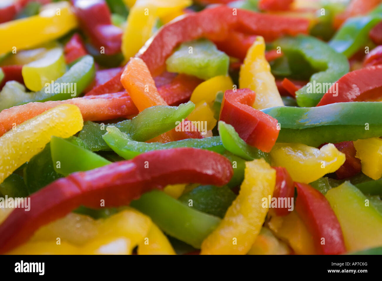 Tricolor peppers in perspective Stock Photo - Alamy
