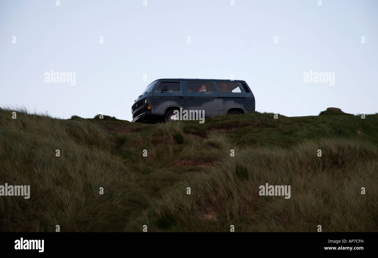 vw camper on cliff Stock Photo - Alamy