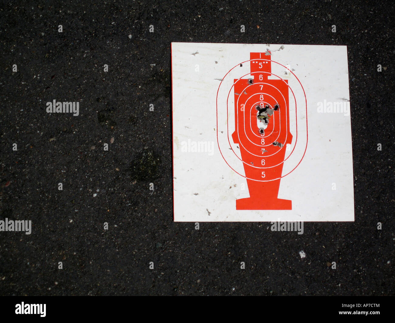 target gun rubbish man sport bullet shot ground Stock Photo - Alamy