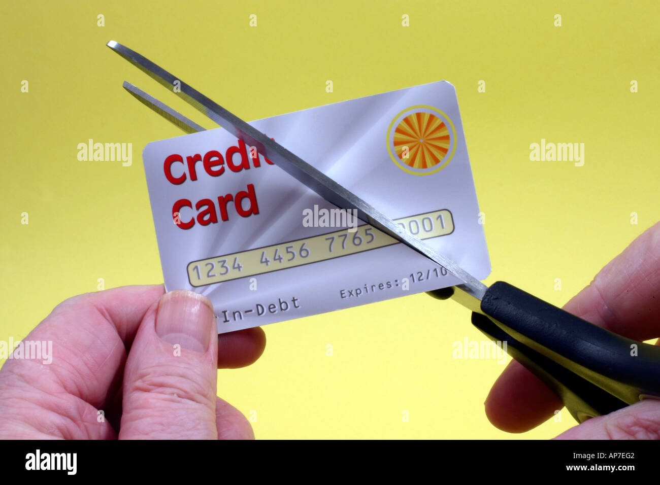 Cutting up a credit card Stock Photo - Alamy