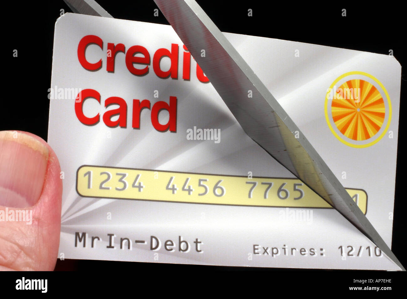 Cutting up a credit card Stock Photo - Alamy