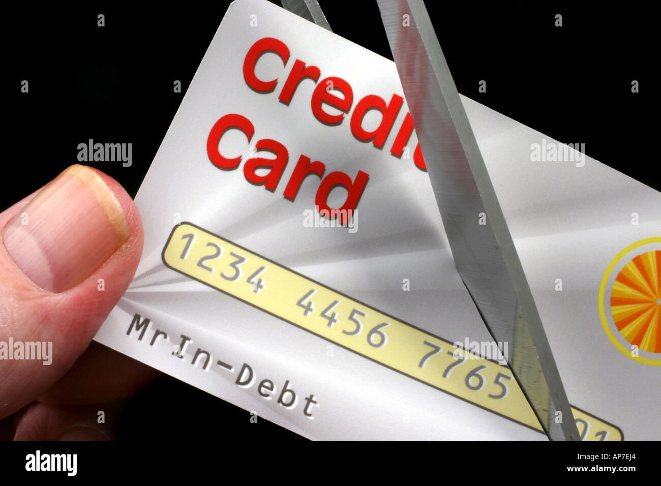 Cutting up a credit card Stock Photo - Alamy