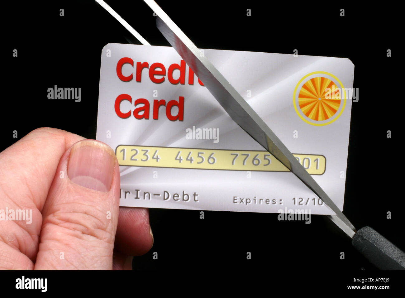 Cutting up a credit card Stock Photo - Alamy