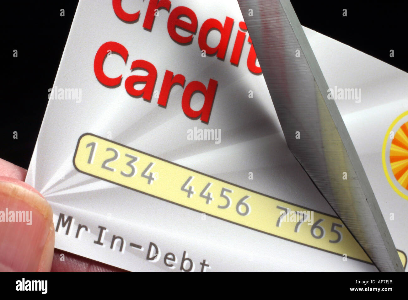 Cutting up a credit card Stock Photo - Alamy