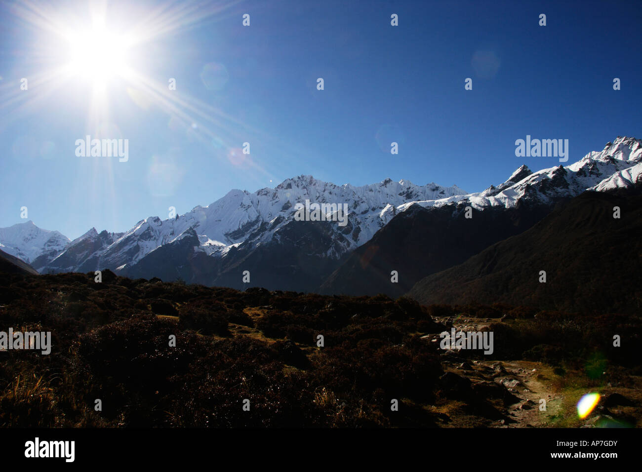 Sun over the Himalayan mountains Stock Photo - Alamy