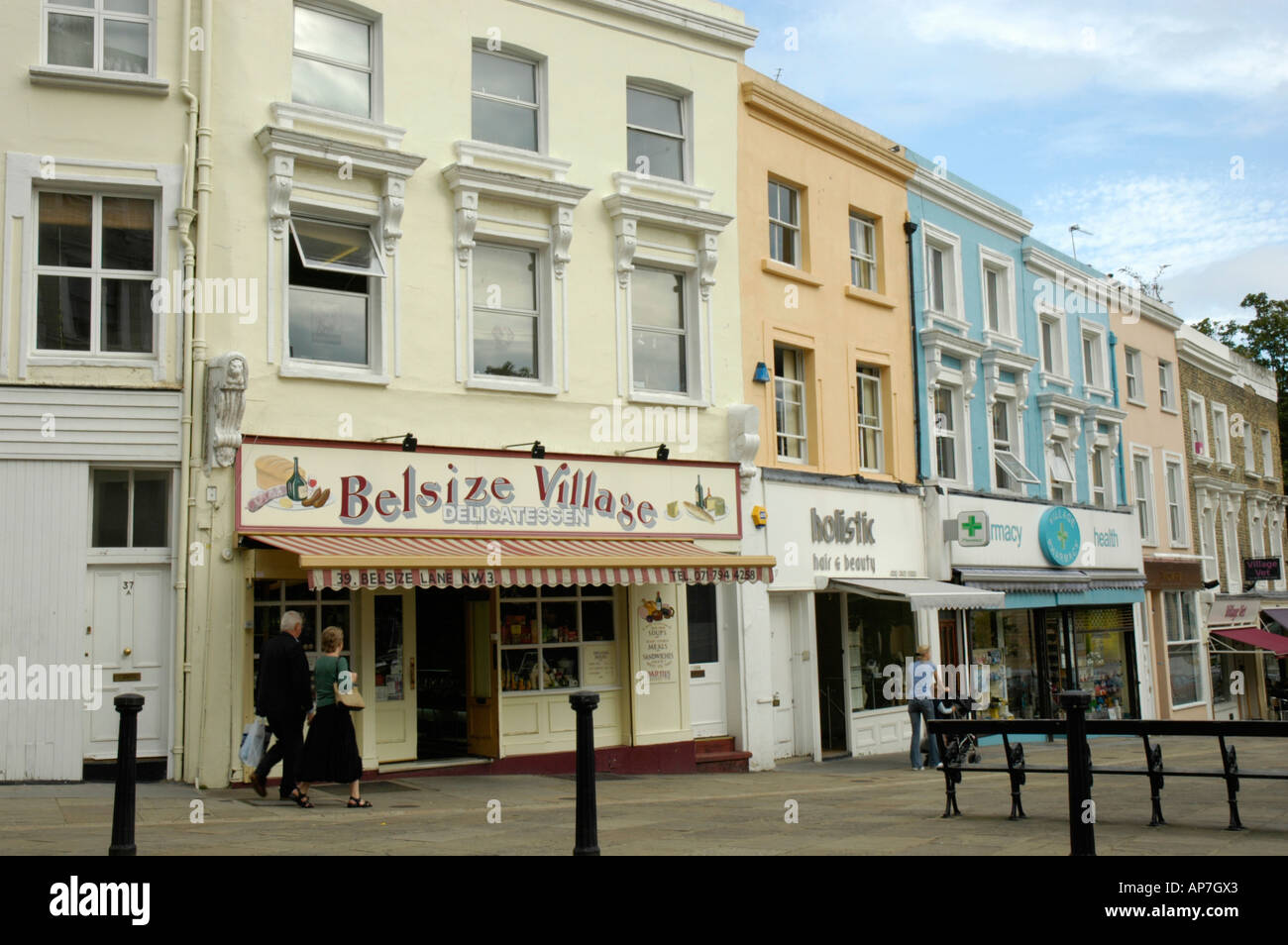 View of colourful painted buildings in Belsize Village, Belsize Park ...