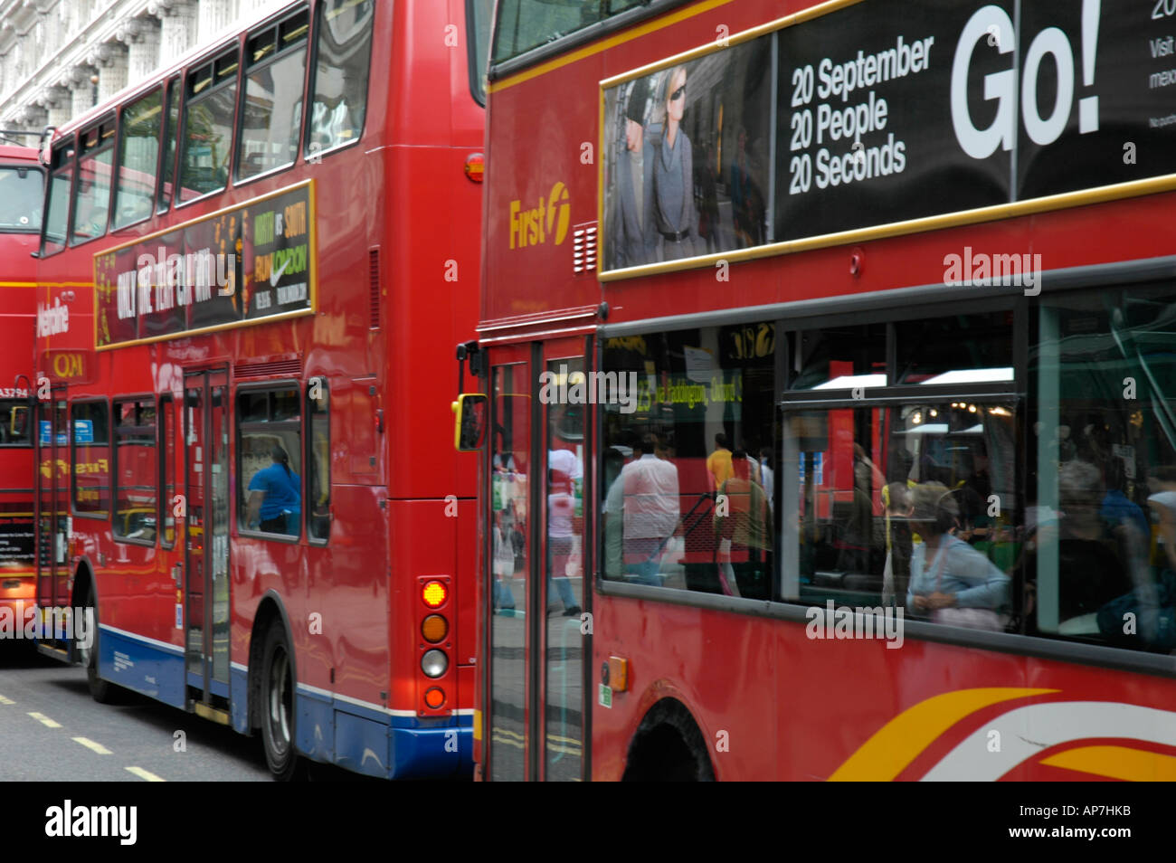Red London buses on Oxford Street London UK Stock Photo - Alamy